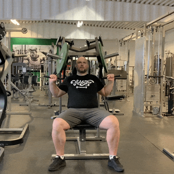 Bröstpress i maskin - Styrkelabbet